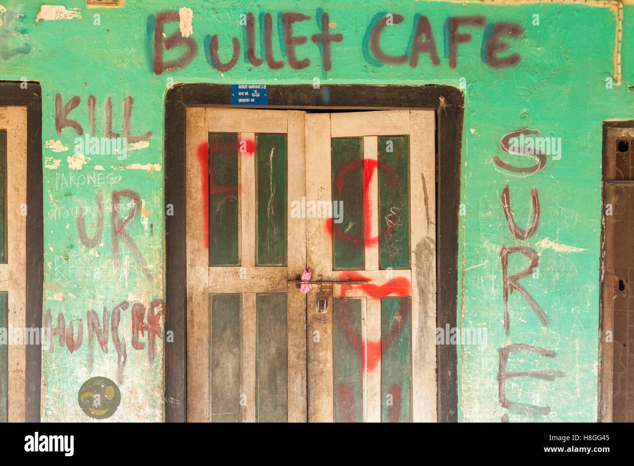 Bullet Cafe: Kill Ur Hunger graffiti, Chitwan, Nepal Stock Photo - Alamy