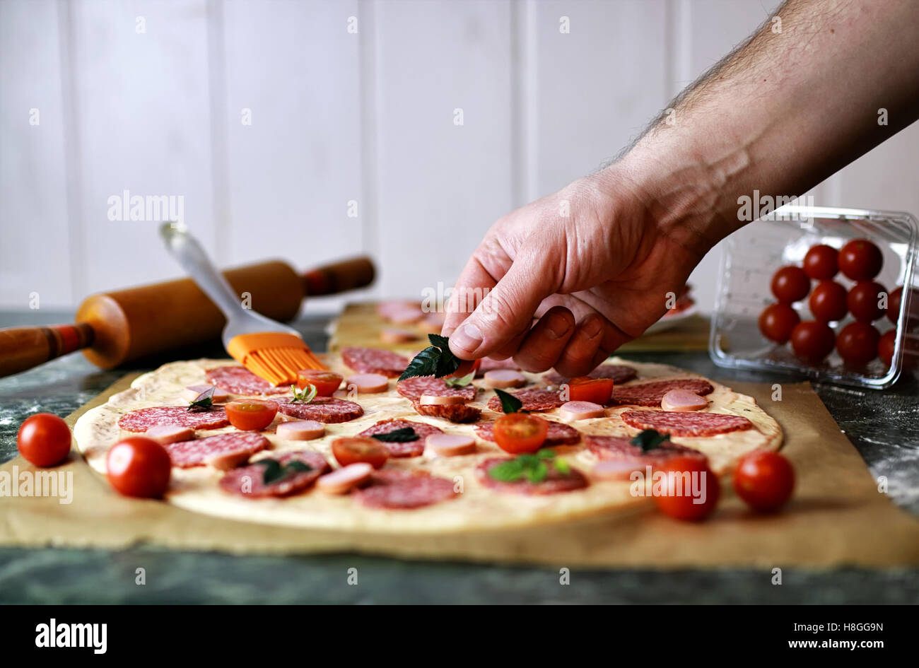 prepare pizza topping Stock Photo - Alamy
