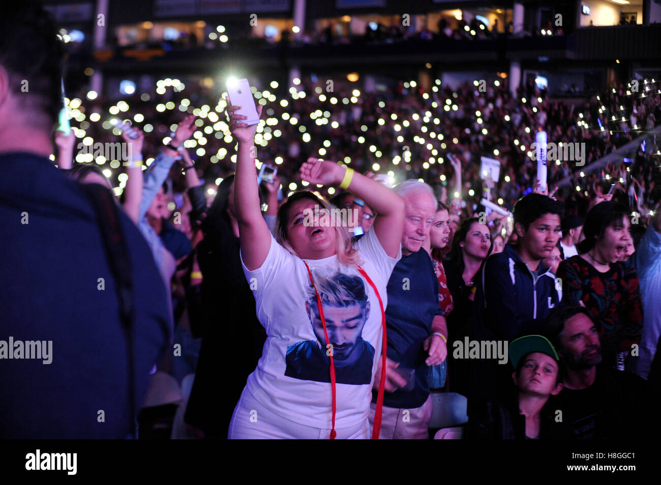 Crowd holding cell phone lights at 102.7 KIIS FM’s Wango Tango 2016 at ...