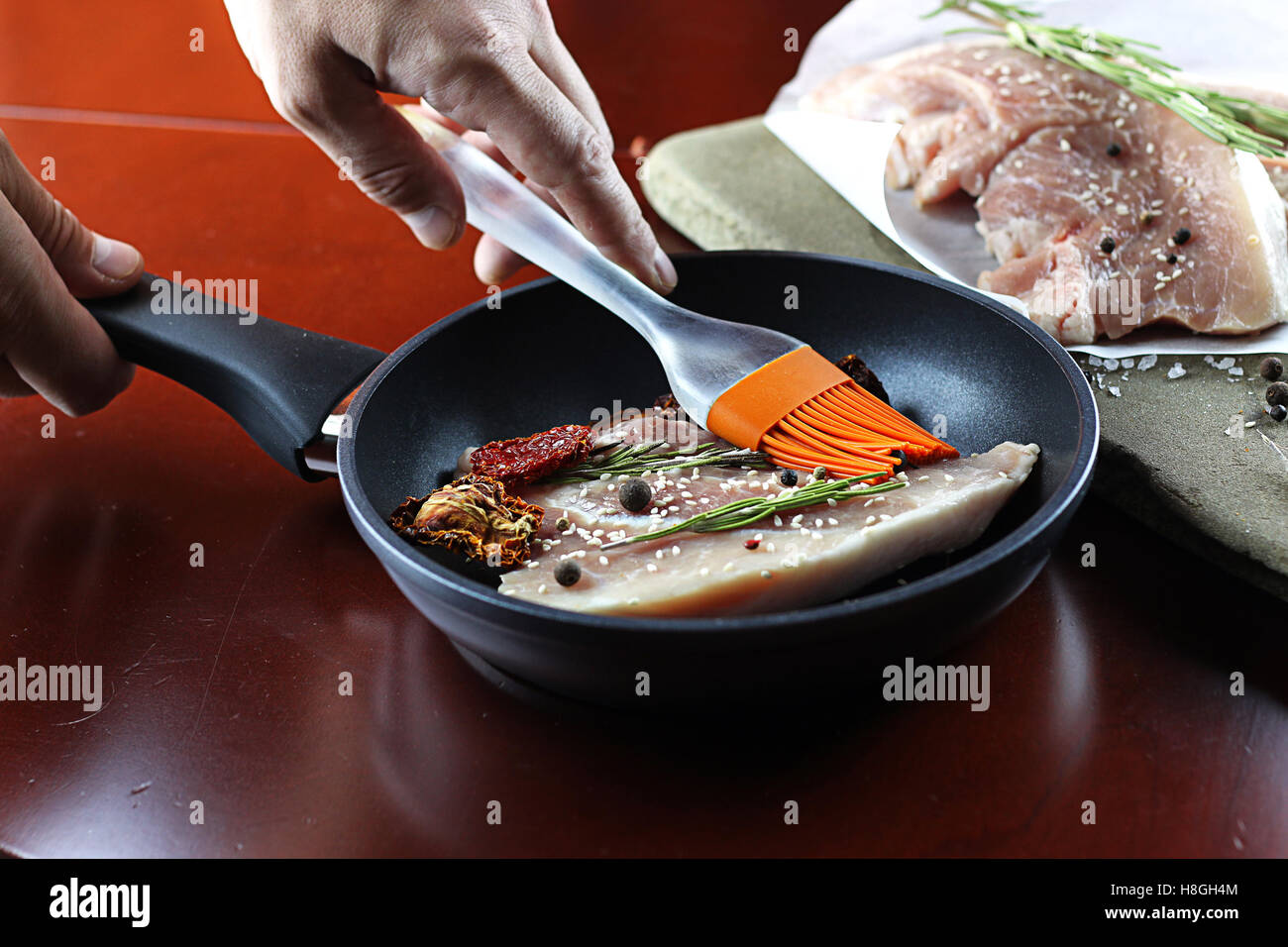 steak in a frying pan Stock Photo - Alamy