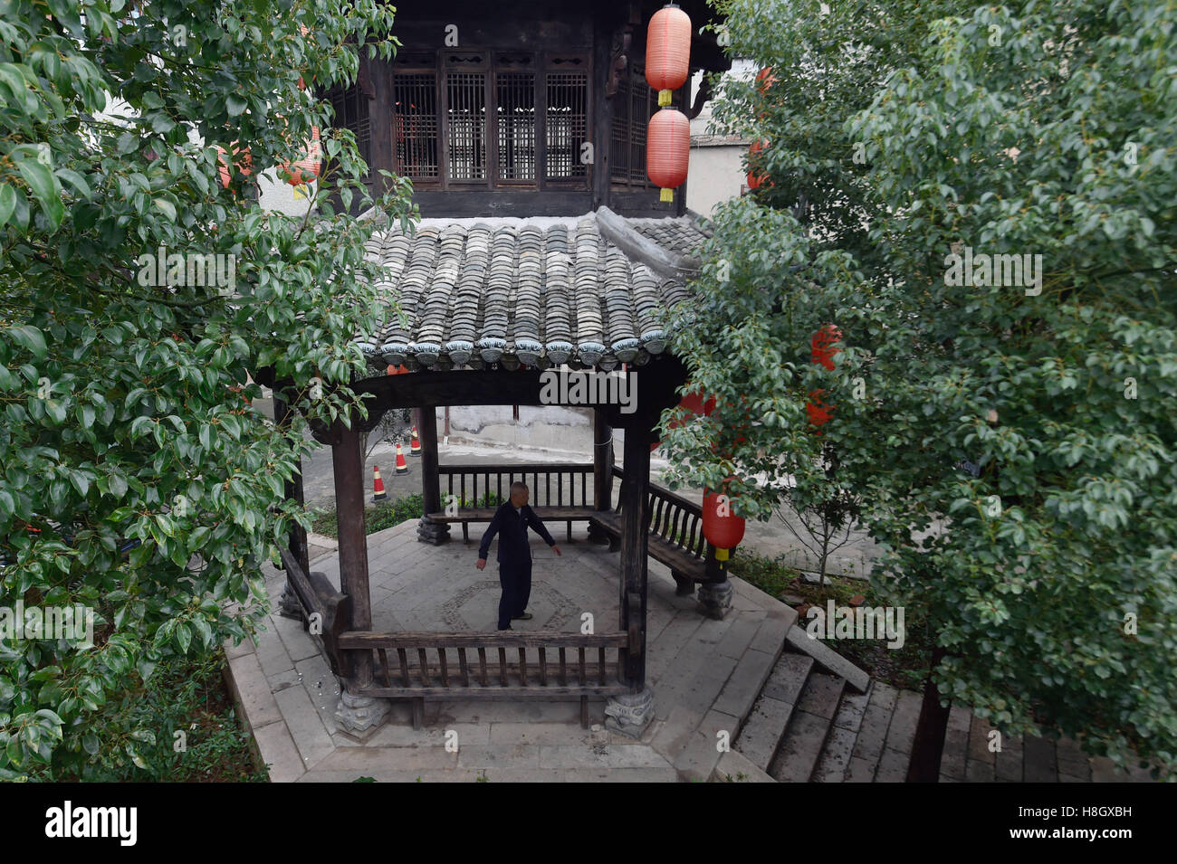Changting, China's Fujian Province. 13th Nov, 2016. A man does morning ...