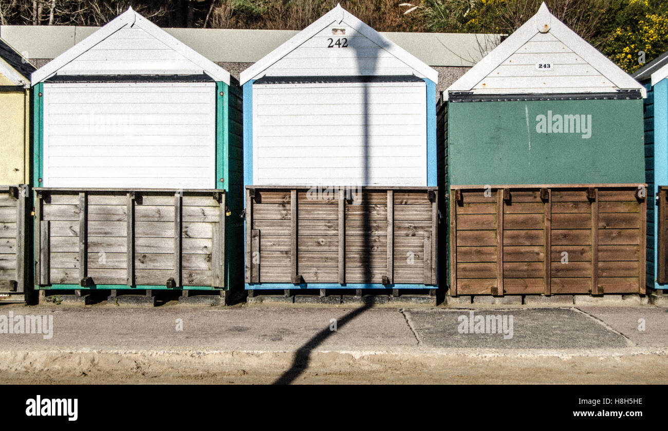 A portrait of three beach huts in a row Stock Photo - Alamy