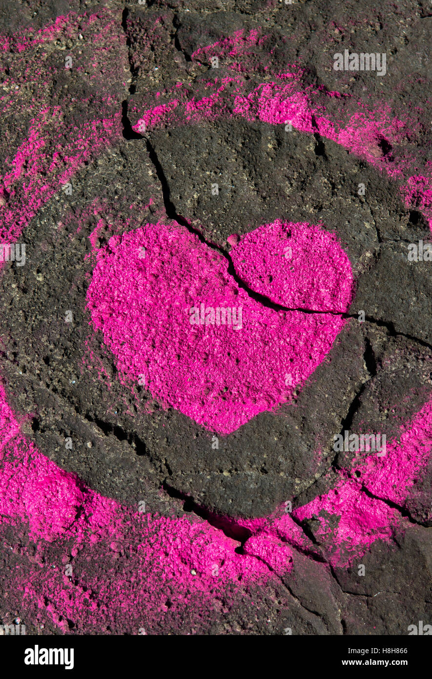 Pink Heart Painted on Rock Stock Photo - Alamy
