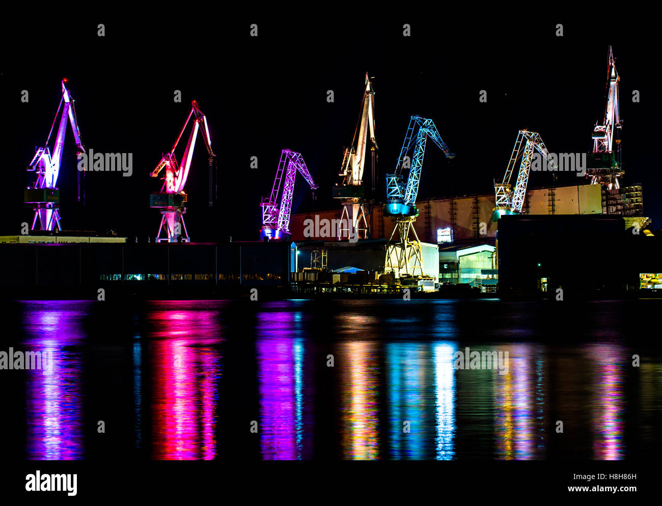 Colorful Illuminated Cranes in Harbor in the Night Stock Photo - Alamy