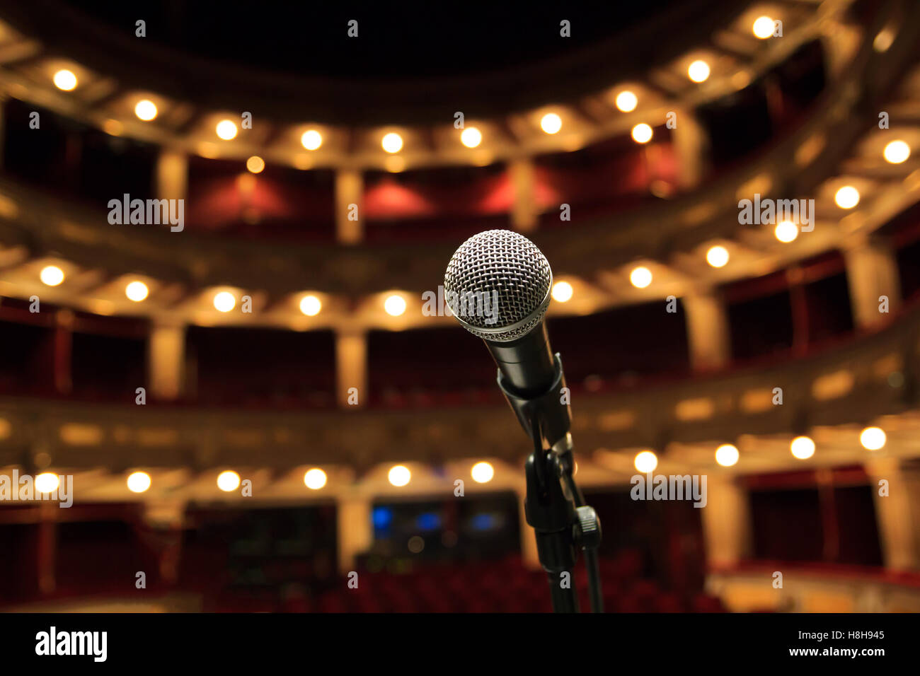 Microphone closeup in concert hall Stock Photo - Alamy