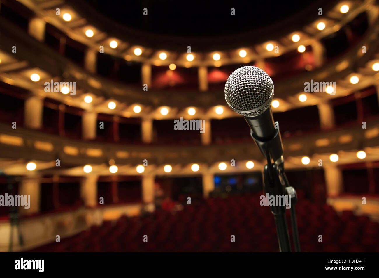 Microphone closeup in concert hall Stock Photo - Alamy