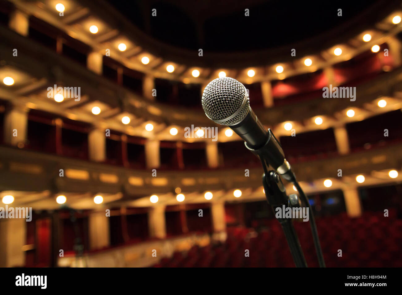 Microphone closeup in concert hall Stock Photo - Alamy