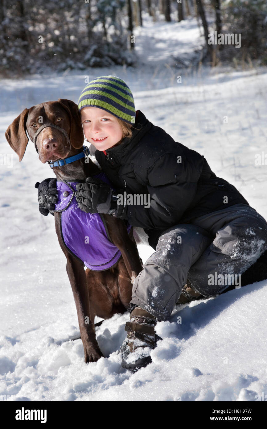 Young boy and dog Stock Photo - Alamy