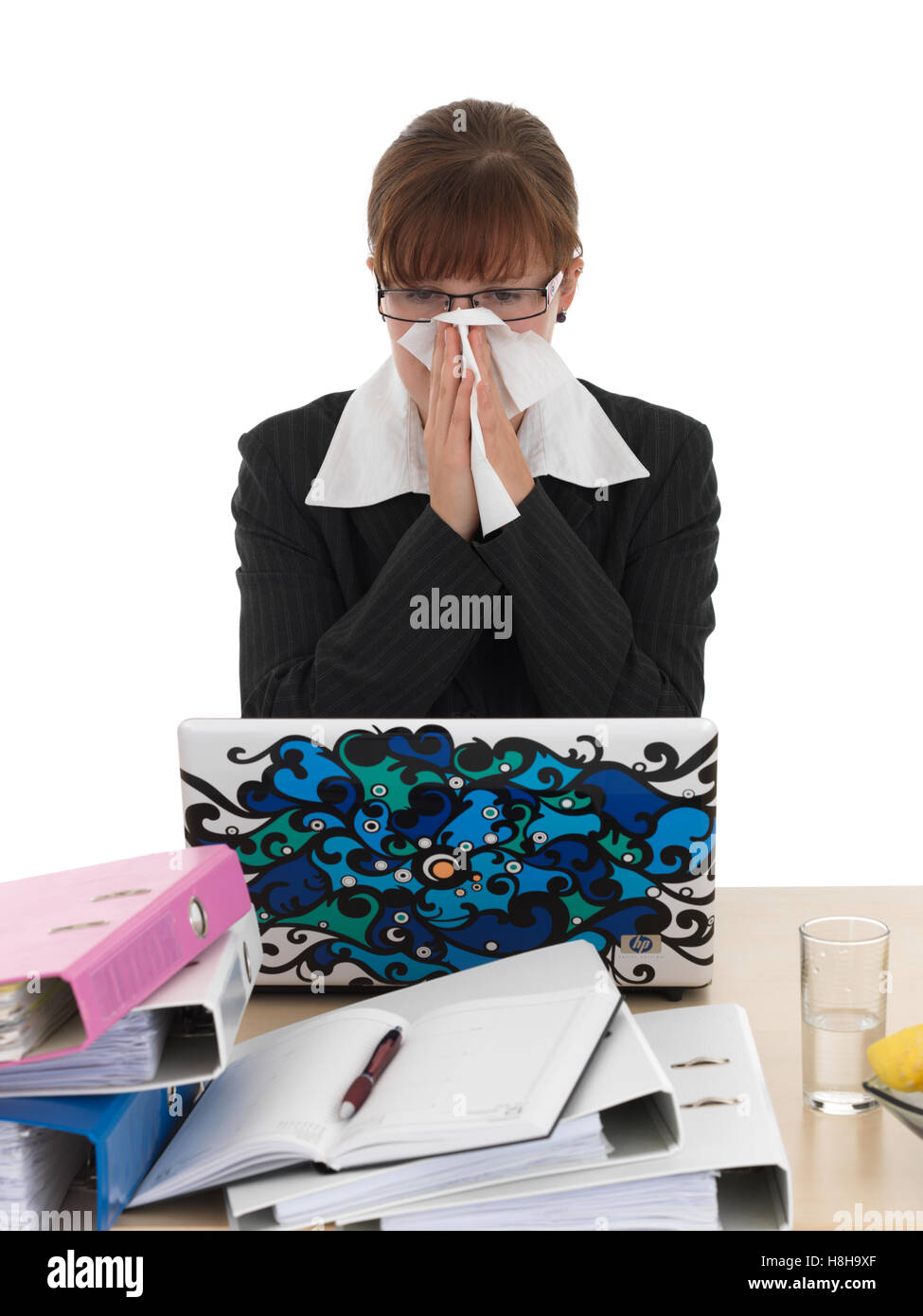 Woman with a cold at work Stock Photo - Alamy