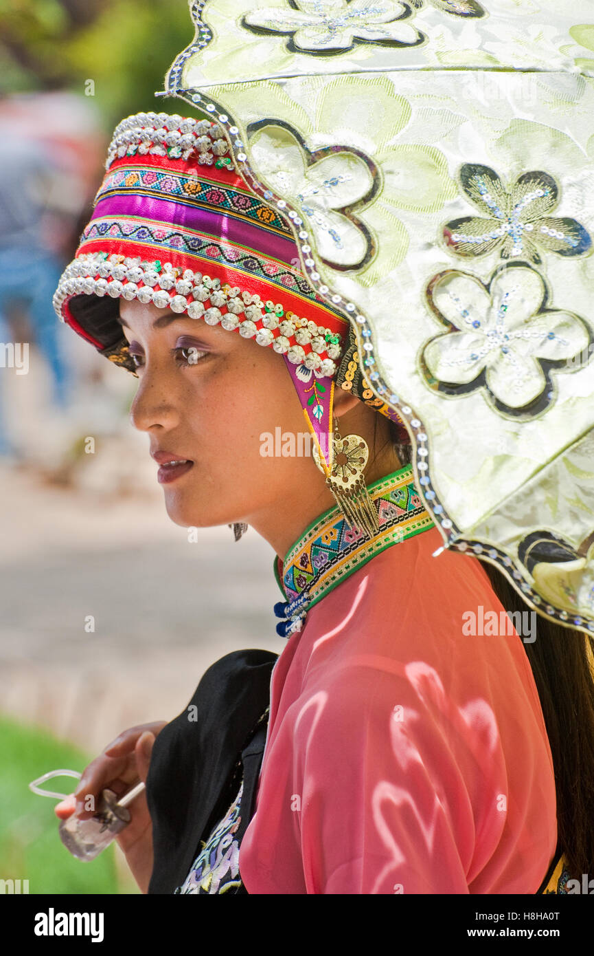 Young Chinese woman in traditional dress of the Yi minority, South ...