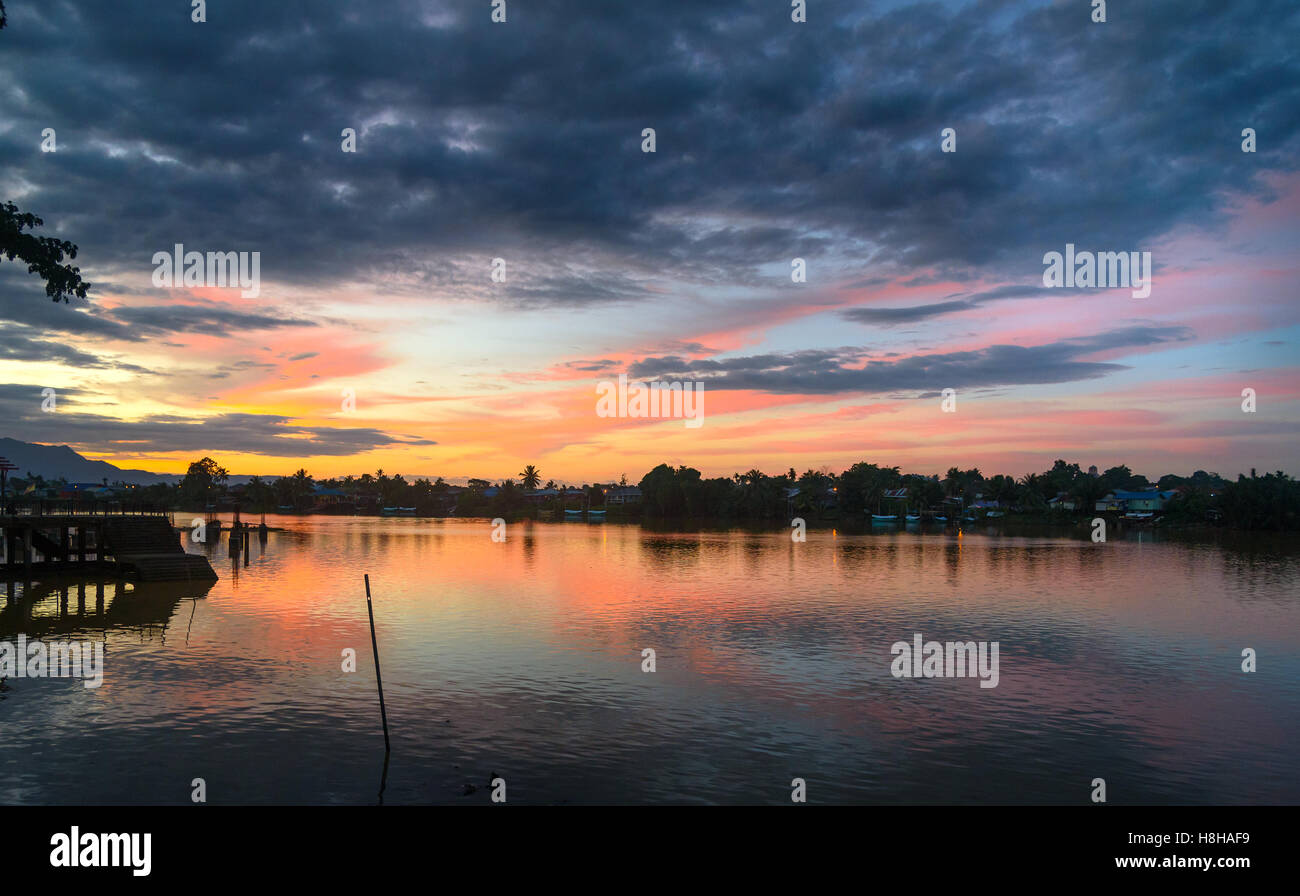 View Sarawak river from waterfront in Kuching city at sunset. Sarawak ...
