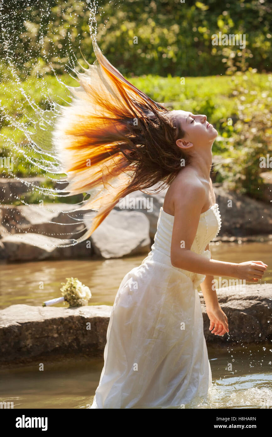 Quirky bride on the day of their wedding Stock Photo - Alamy