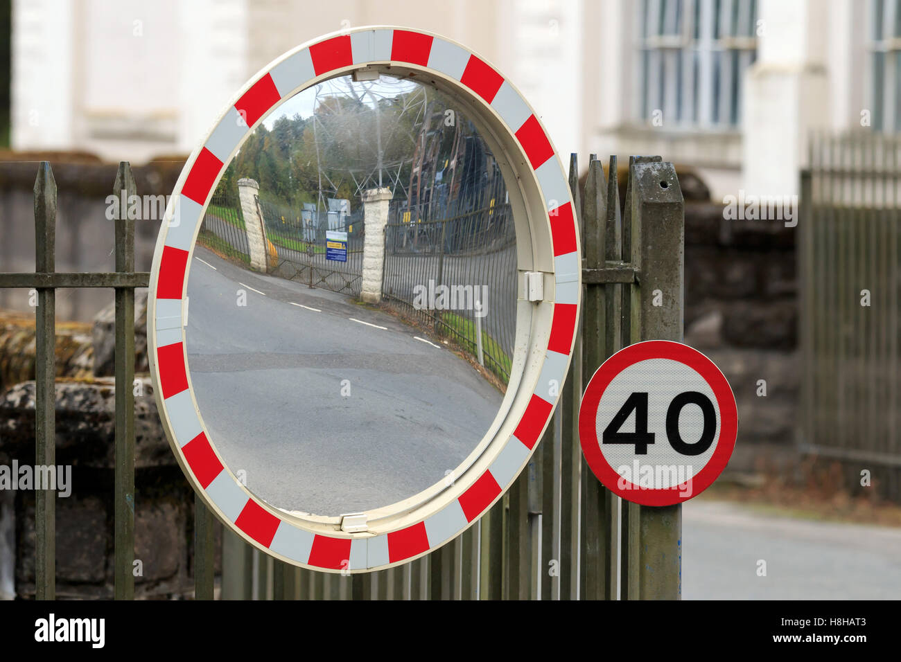40 mph sign and road traffic safety mirror fixed to a set of steel ...