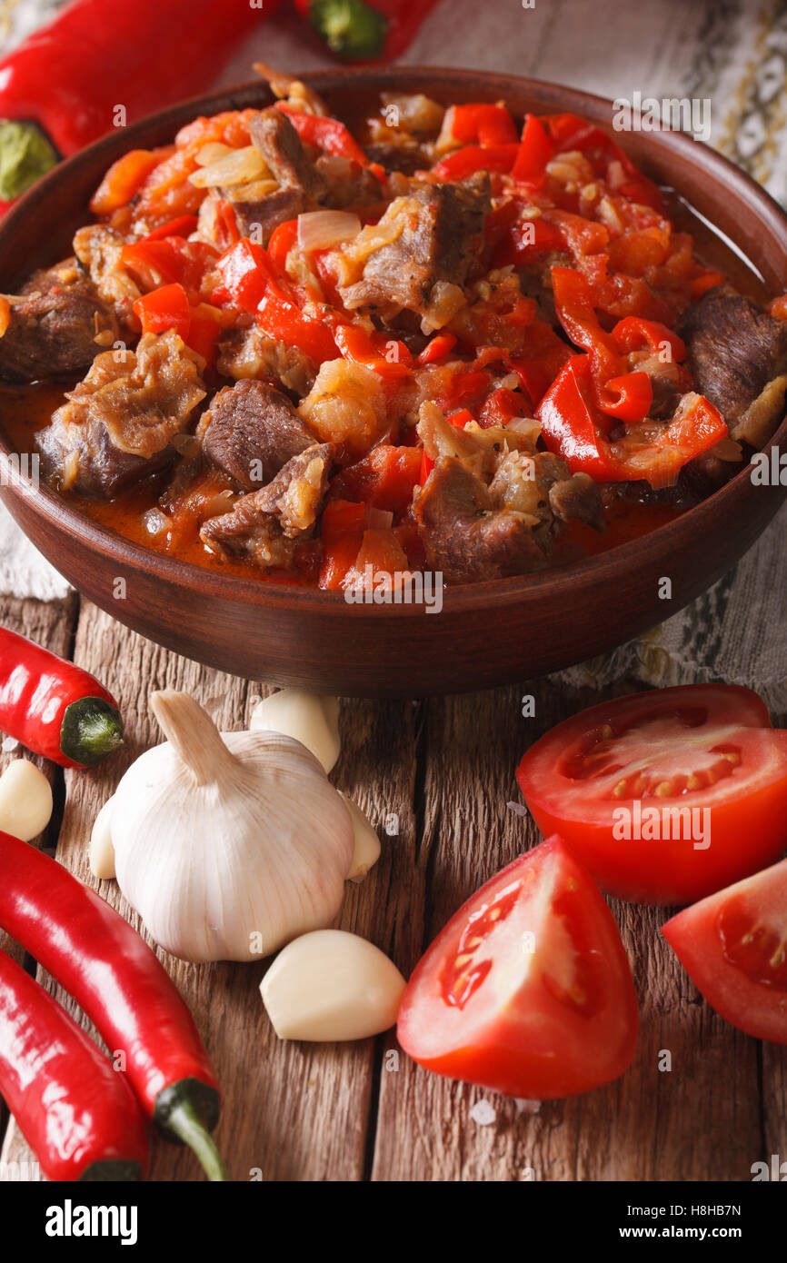 Arabic cuisine: lamb stew with vegetables close up in a bowl on the ...