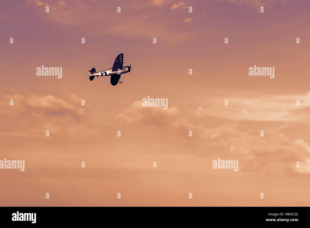 Radio controlled toy airplane at sunset. RC model airplane flying in ...