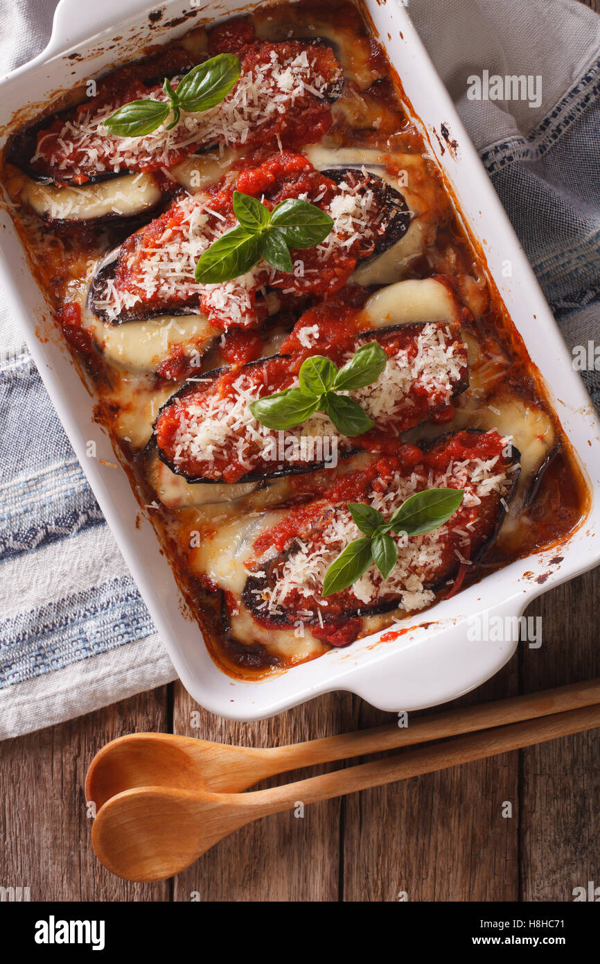 Italian eggplant Melanzane alla parmigiana close up in baking dish on ...
