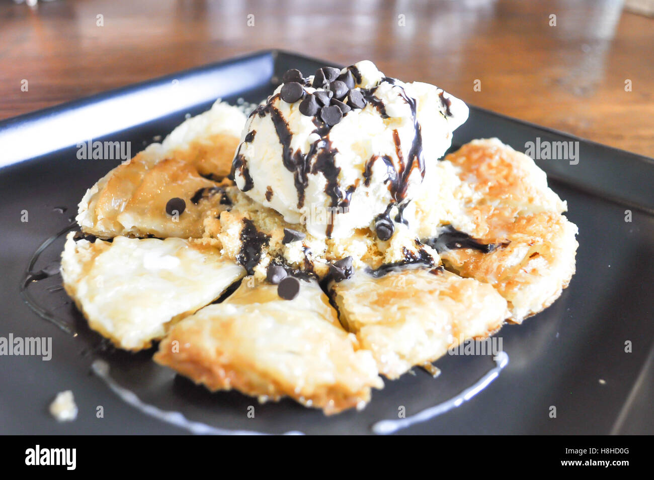 roti with ice cream topping dish Stock Photo - Alamy