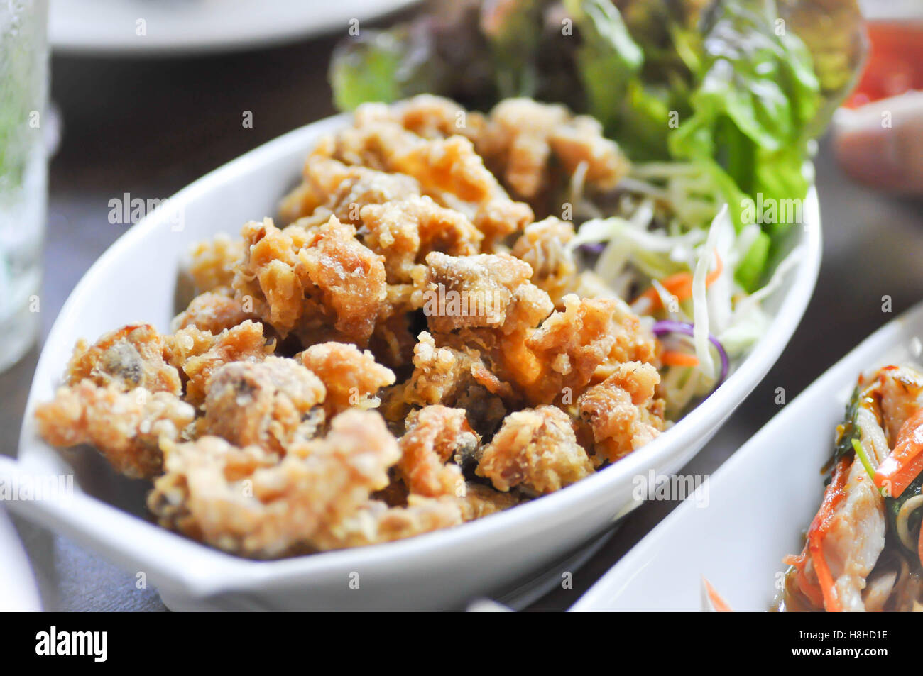 deep fried chicken tendon or fried chicken dish Stock Photo - Alamy