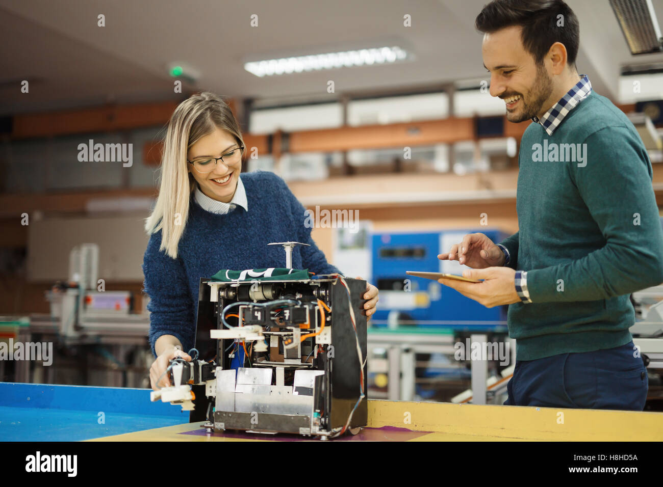 Robotics engineer students teamwork on project Stock Photo - Alamy