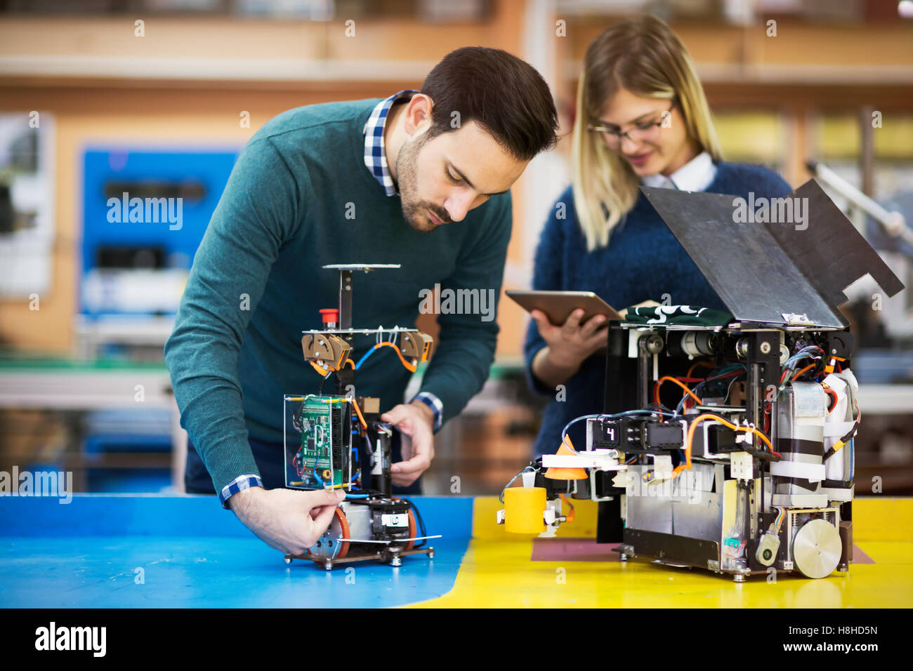 Robotics engineer students teamwork on project Stock Photo - Alamy