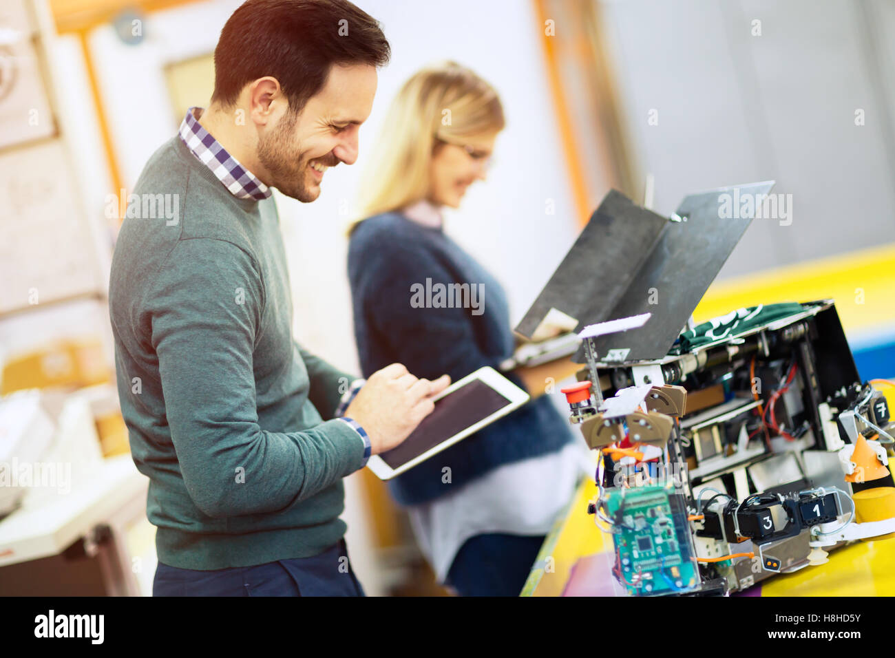 Robotics engineer students teamwork on project Stock Photo - Alamy