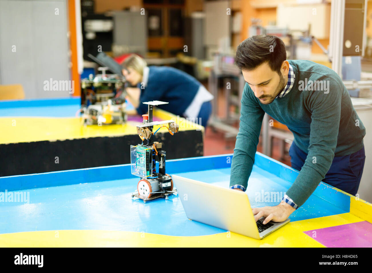 Robotics engineer students teamwork on project Stock Photo - Alamy