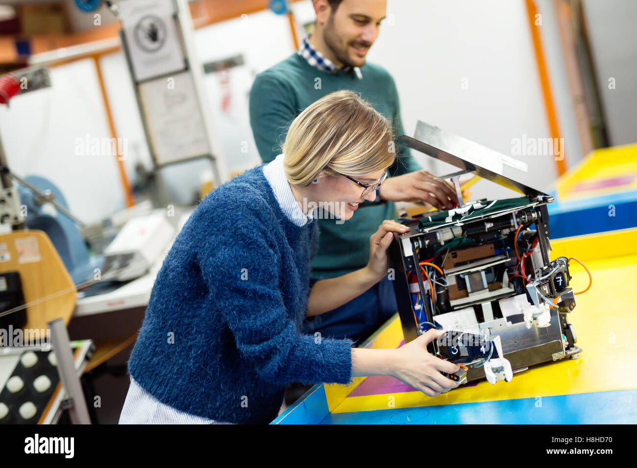 Engineering robotics class teamwork by students Stock Photo - Alamy