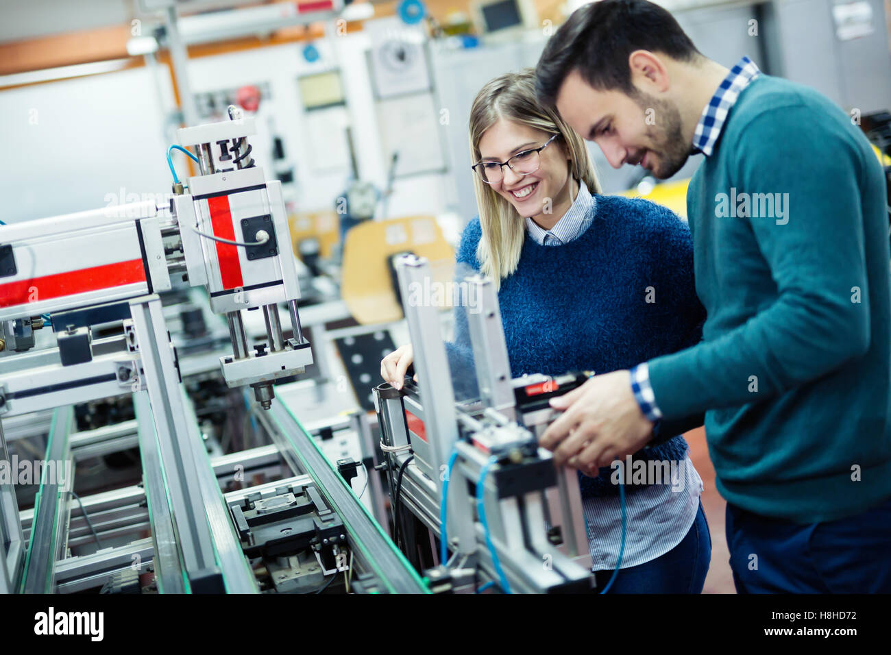 Engineering robotics class teamwork by students Stock Photo - Alamy