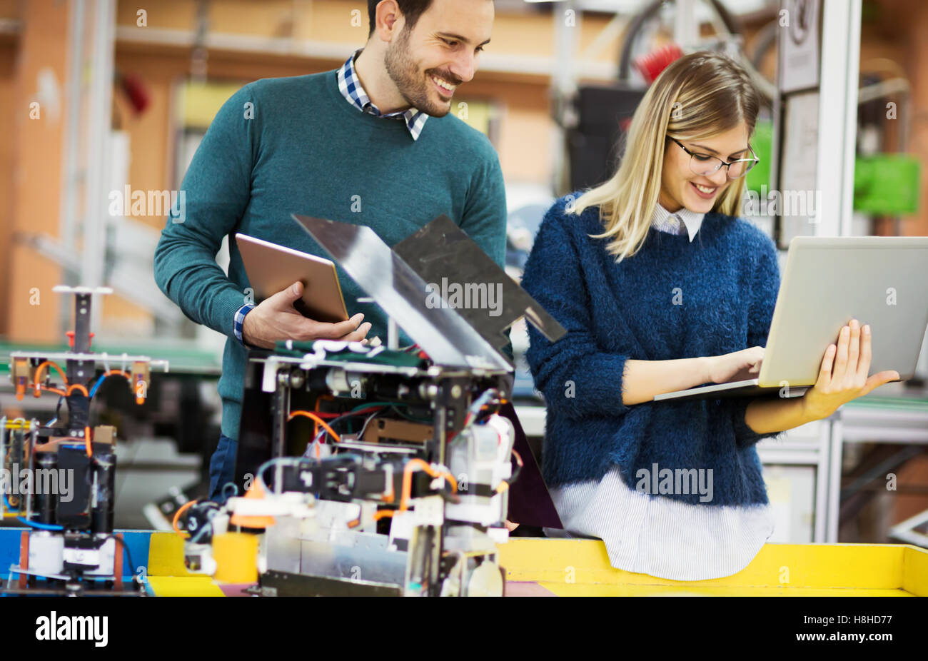 Engineering robotics class teamwork by students Stock Photo - Alamy