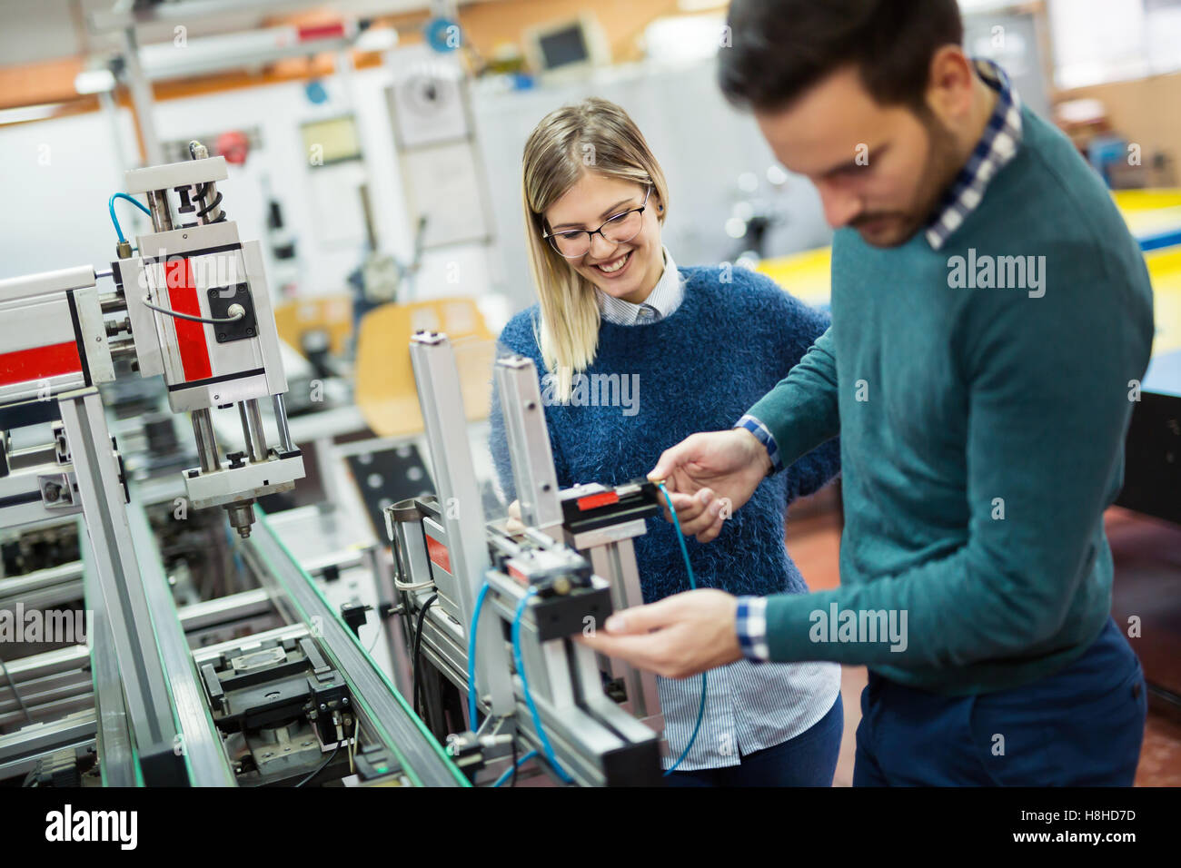 Students working on engineering class project Stock Photo - Alamy