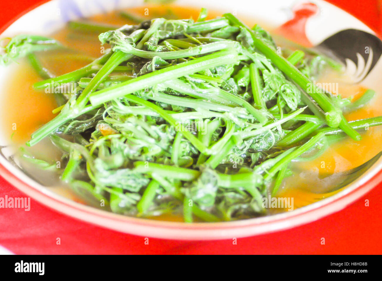 stir-fried chayote leaf dish Stock Photo - Alamy