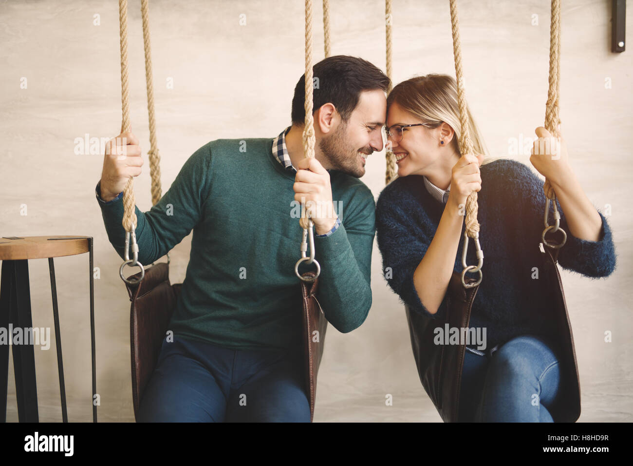 Man swinging woman hi-res stock photography and images - Alamy