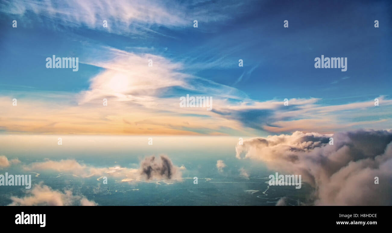 The flight over clouds Stock Photo - Alamy