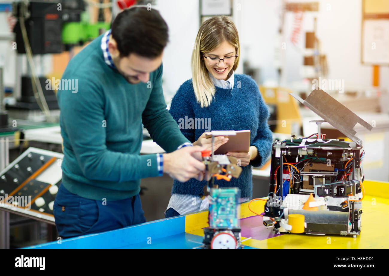 Robotics engineer students teamwork on project Stock Photo - Alamy