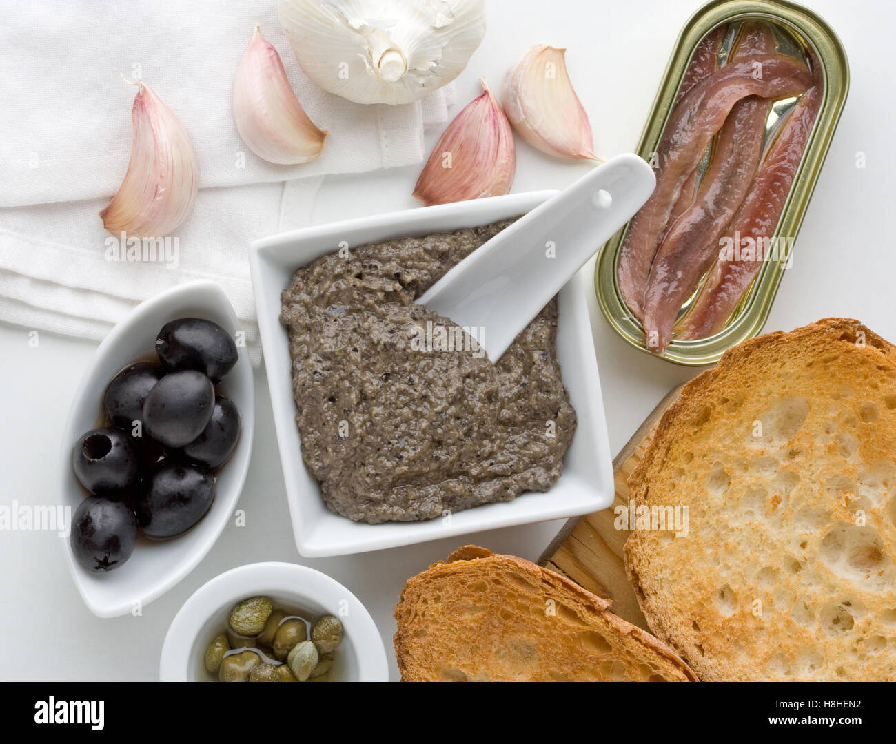 Tapenade, traditional Provence sauce with black olives, capers, garlic ...