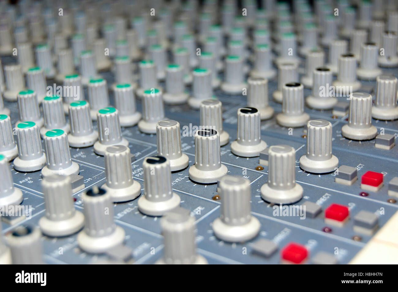 Close-up of studio mixer knobs Stock Photo - Alamy