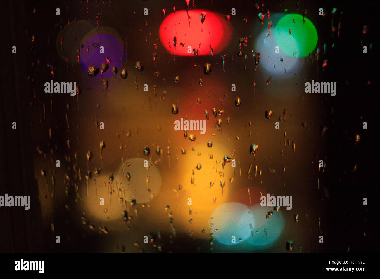 Abstract rainy window background with bokeh lights Stock Photo - Alamy