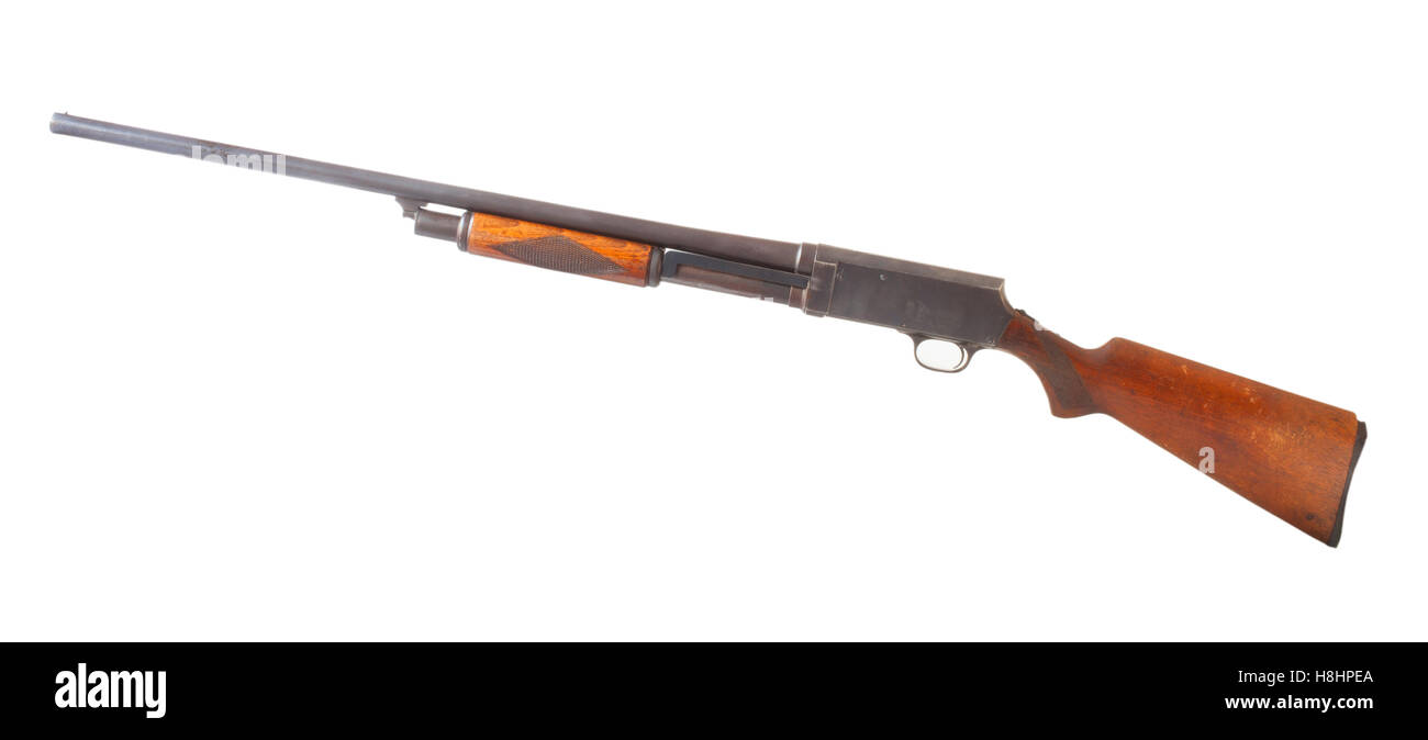 Old pump action shotgun that is isolated on white Stock Photo - Alamy