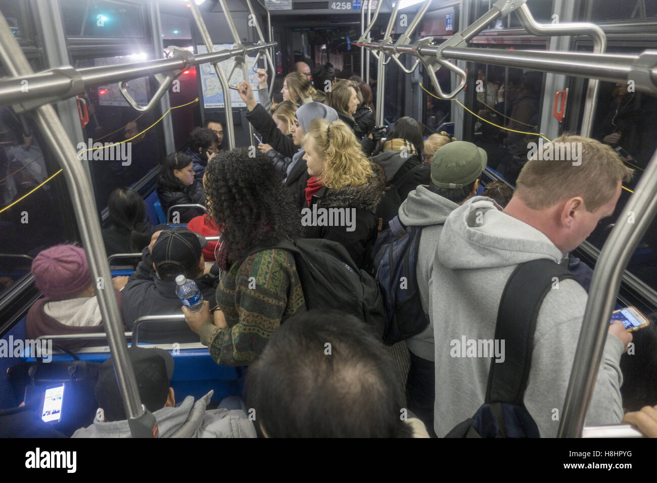 Evening rush hour on a New York City bus going to Staten Island Stock ...