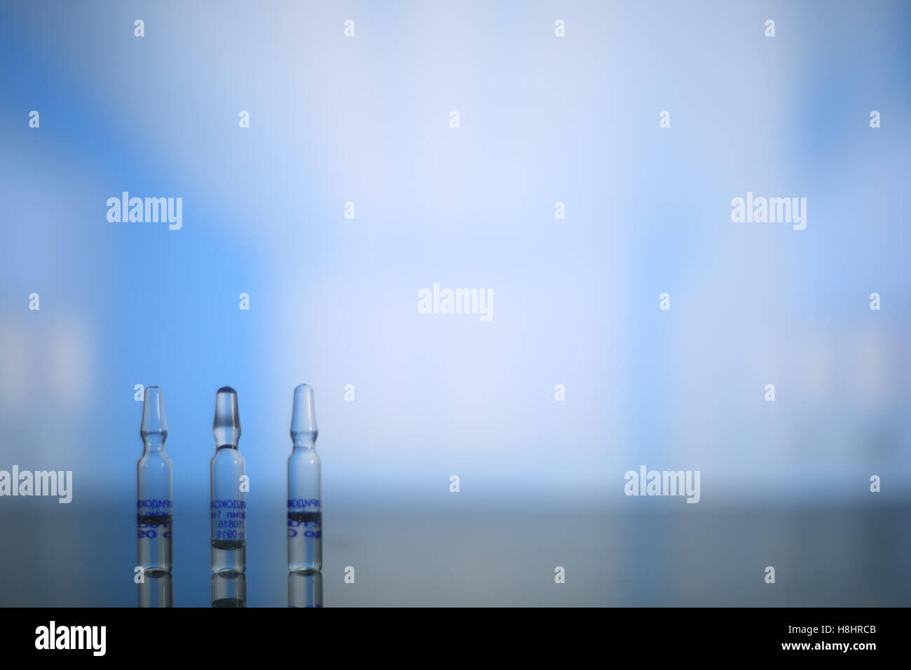 Group of Medical vials on table in hospital Stock Photo - Alamy