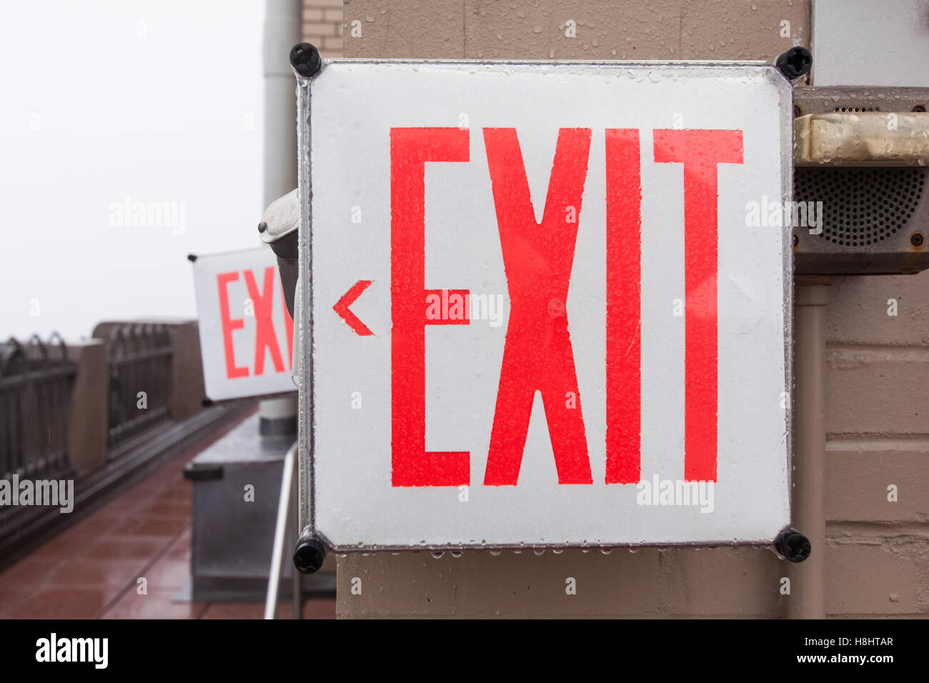 Exit sign, Top of the rock viewpoint in thick fog, Rockefeller center ...