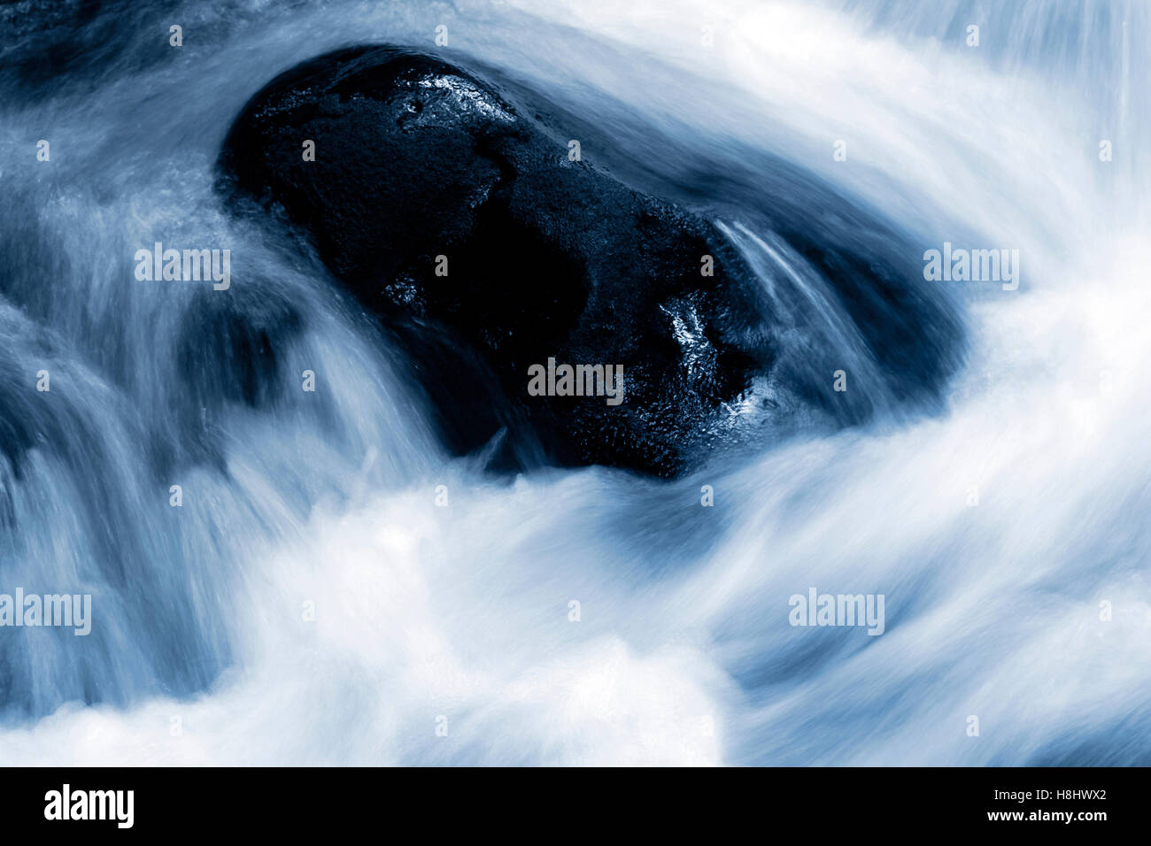 Rapid water movement over rocks hi-res stock photography and images - Alamy