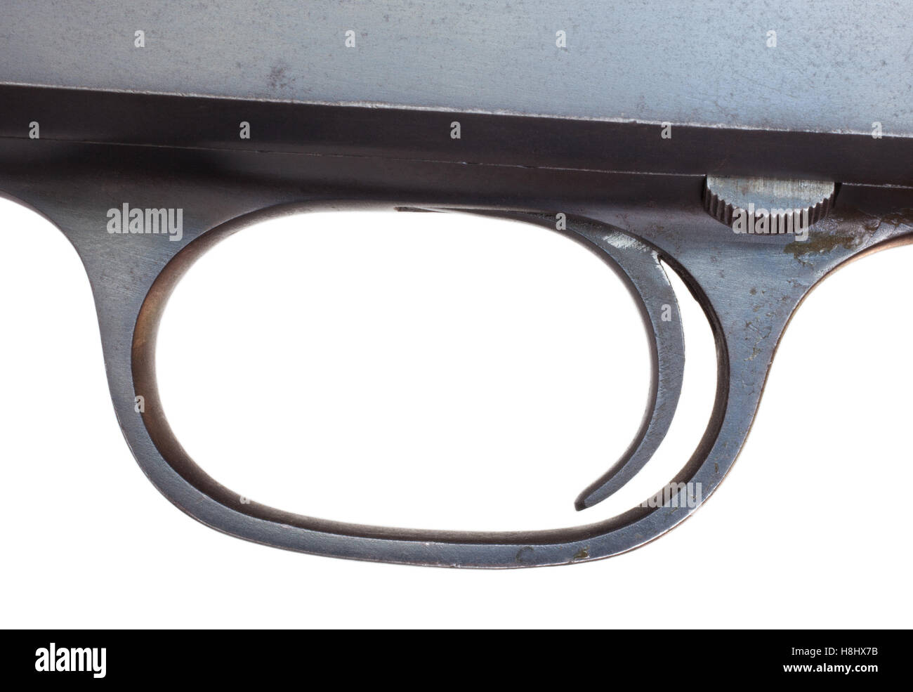 Trigger on a shotgun and bolt release isolated on white Stock Photo - Alamy