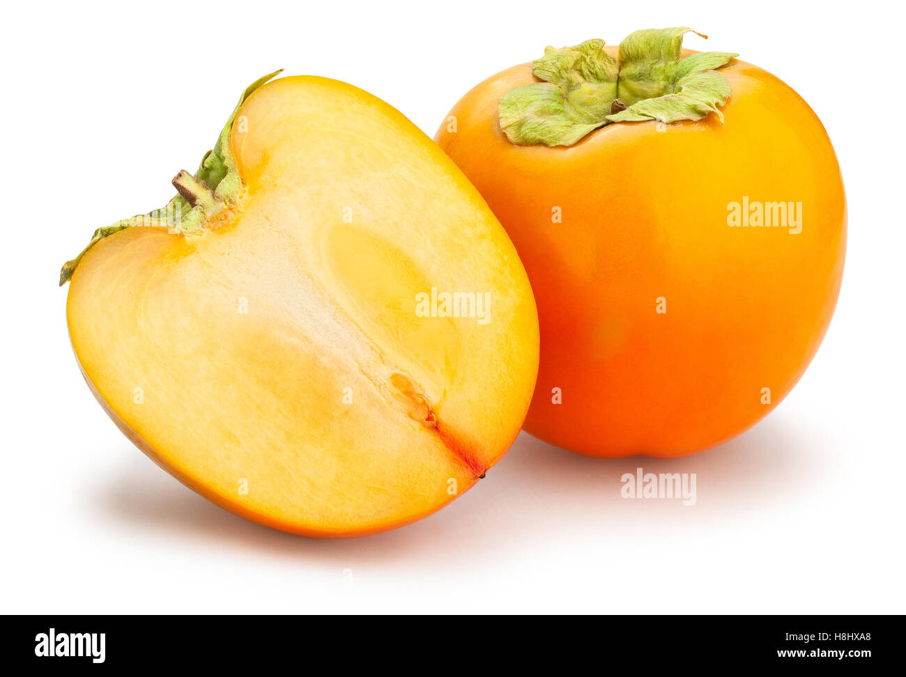 sliced persimmons isolated Stock Photo - Alamy