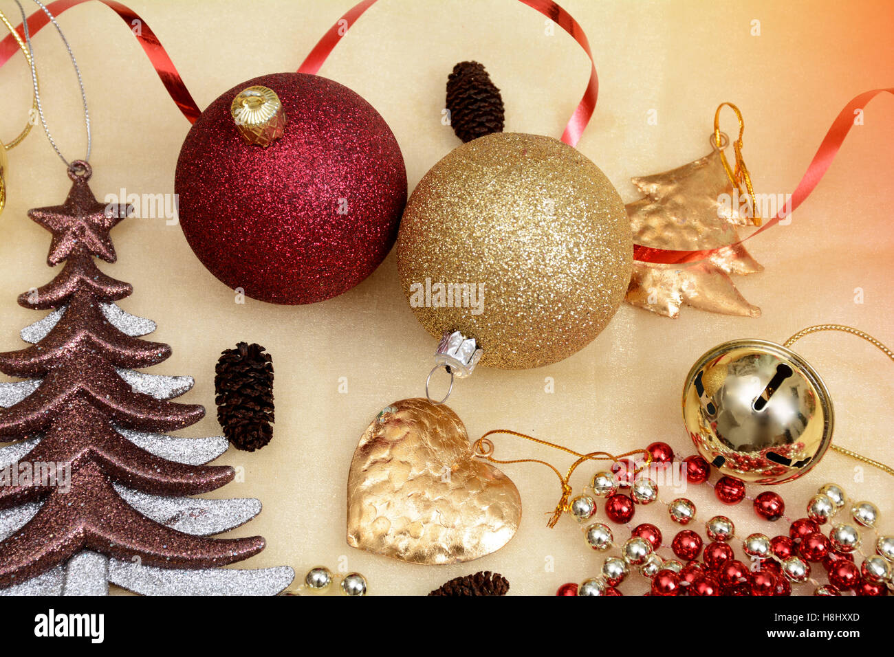 Christmas objects, balls tree and ribon on golden background Stock ...