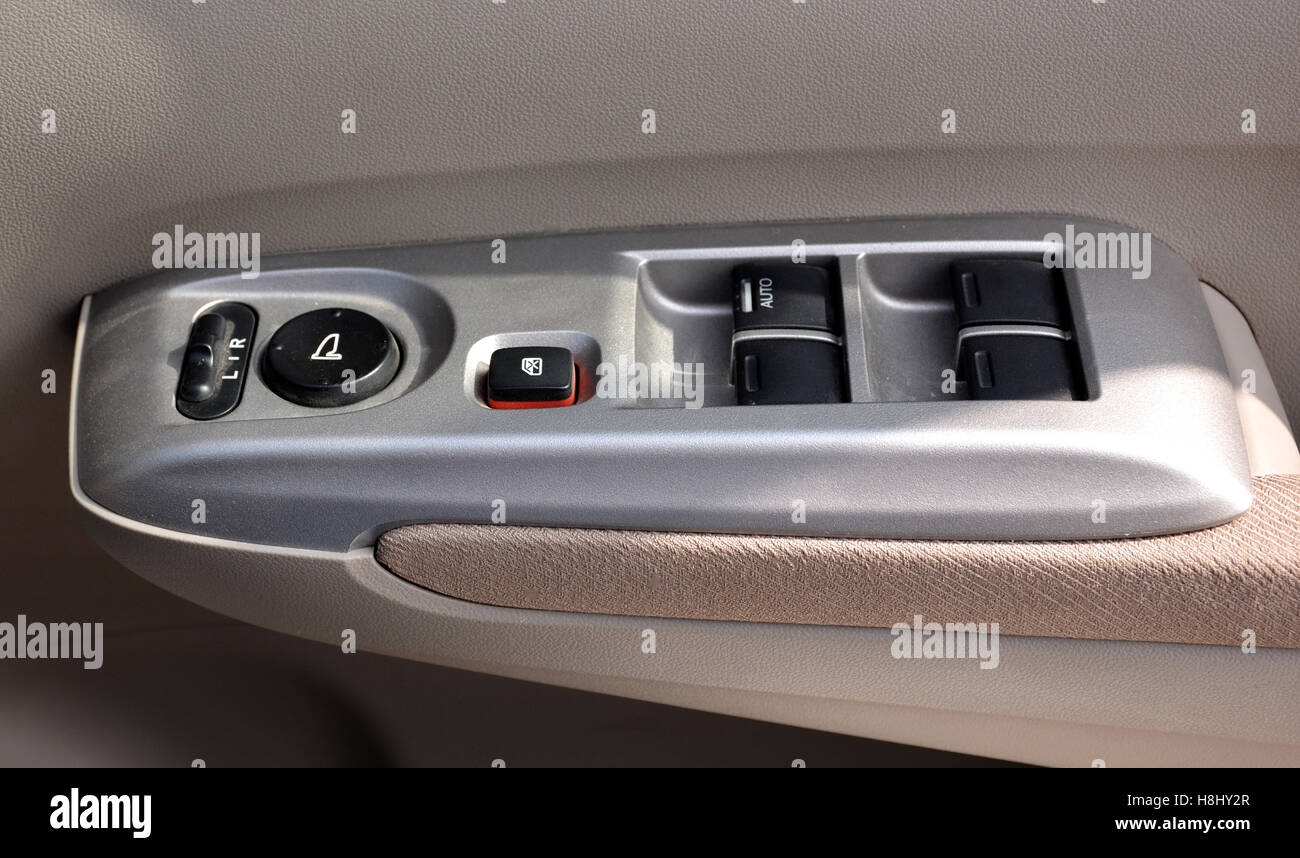 Car Door and Mirror Lock handle inside view Stock Photo - Alamy