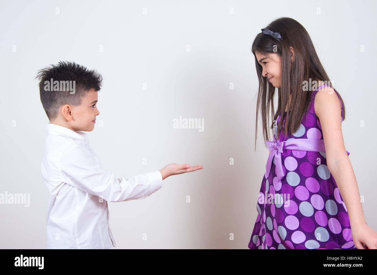 little boy proposing his girlfriend Stock Photo - Alamy