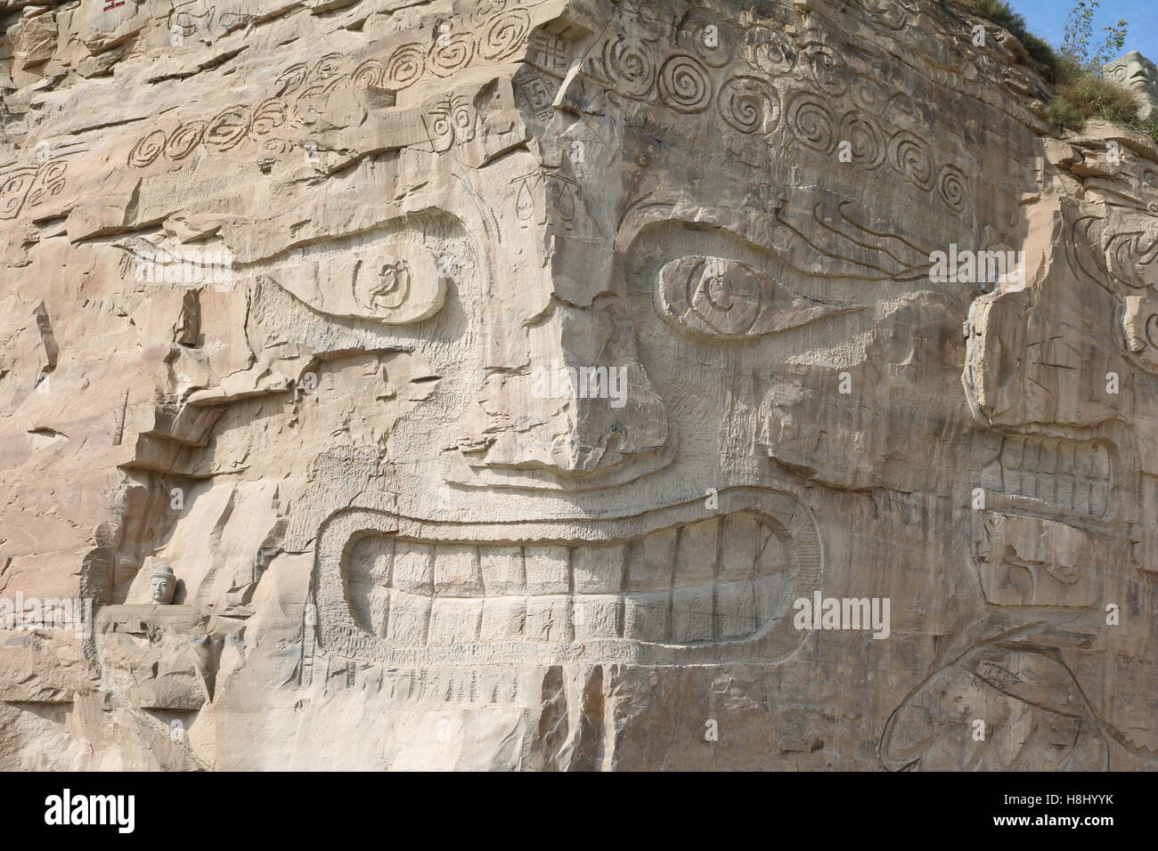 Cliff Face Carving from China Stock Photo - Alamy