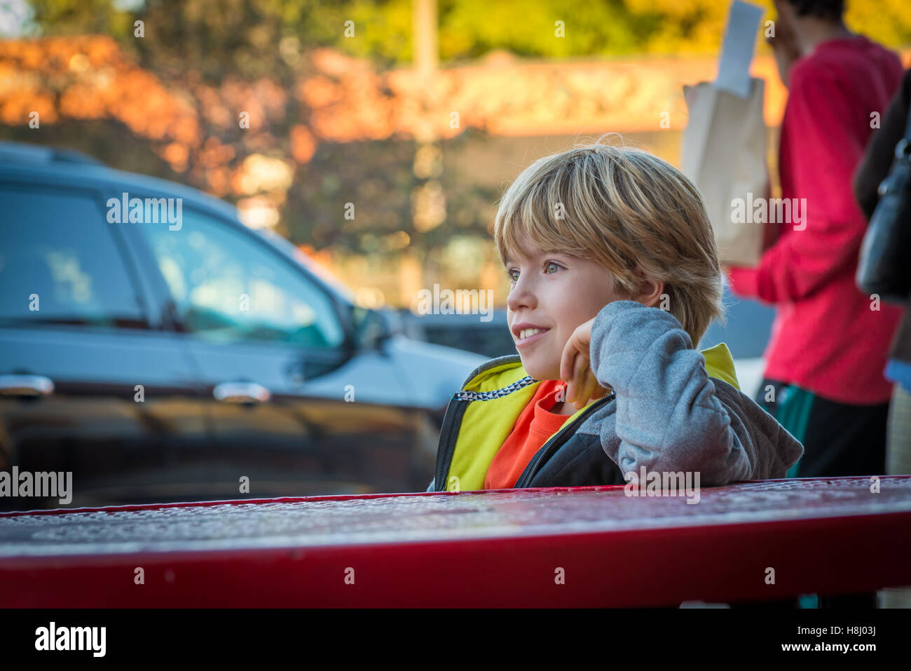 Portrait of a young boy with blurred background Stock Photo - Alamy