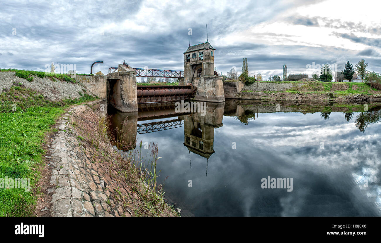 Abandoned old sluice gate. Navigable river. Water gate Stock Photo - Alamy